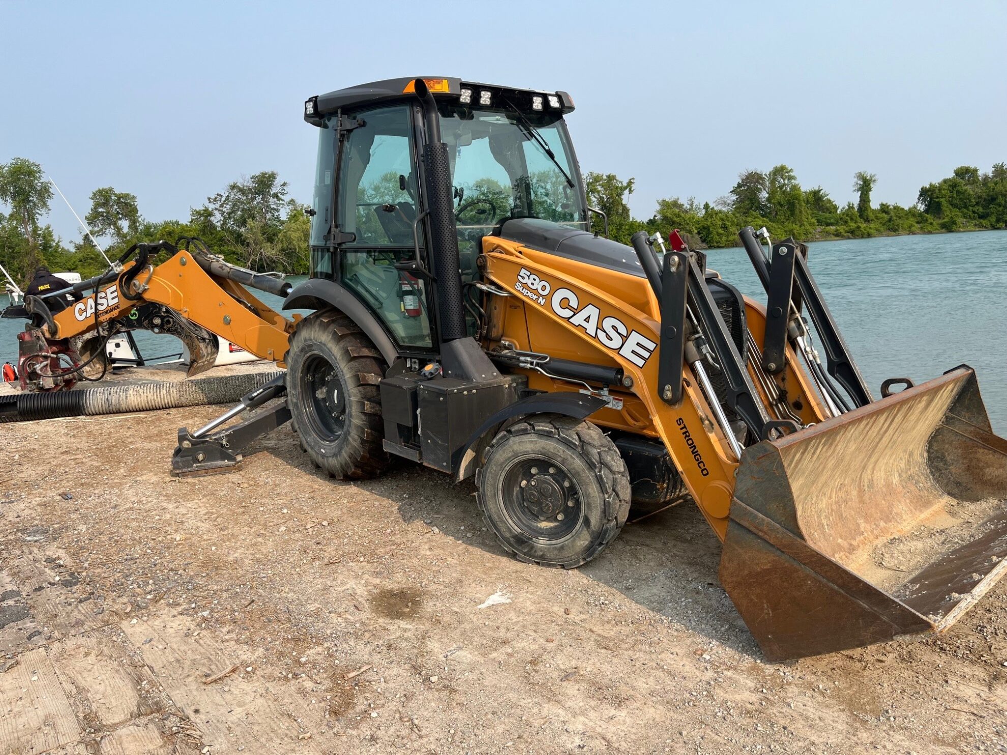 Stolen Backhoe Recovered – Jason DEWSBURY Arrested – Wingham Free Press